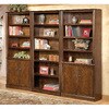 Signature Design by Ashley Hamlyn Medium Brown Wood 4-Shelf Bookcase at ...