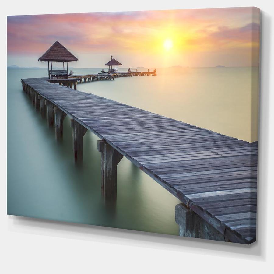 Designart Wooden Sea Bridge and Sunset- Seashore Photo Canvas Print in ...
