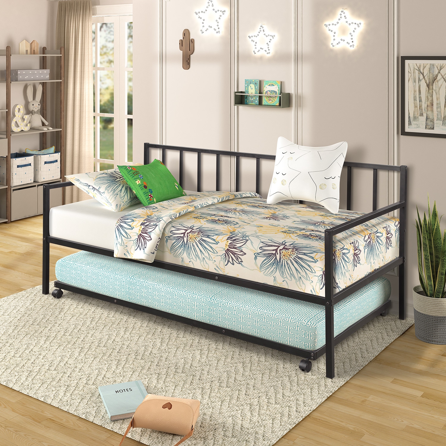Qualler This metal daybed features a sturdy solid steel frame (275lbs ...
