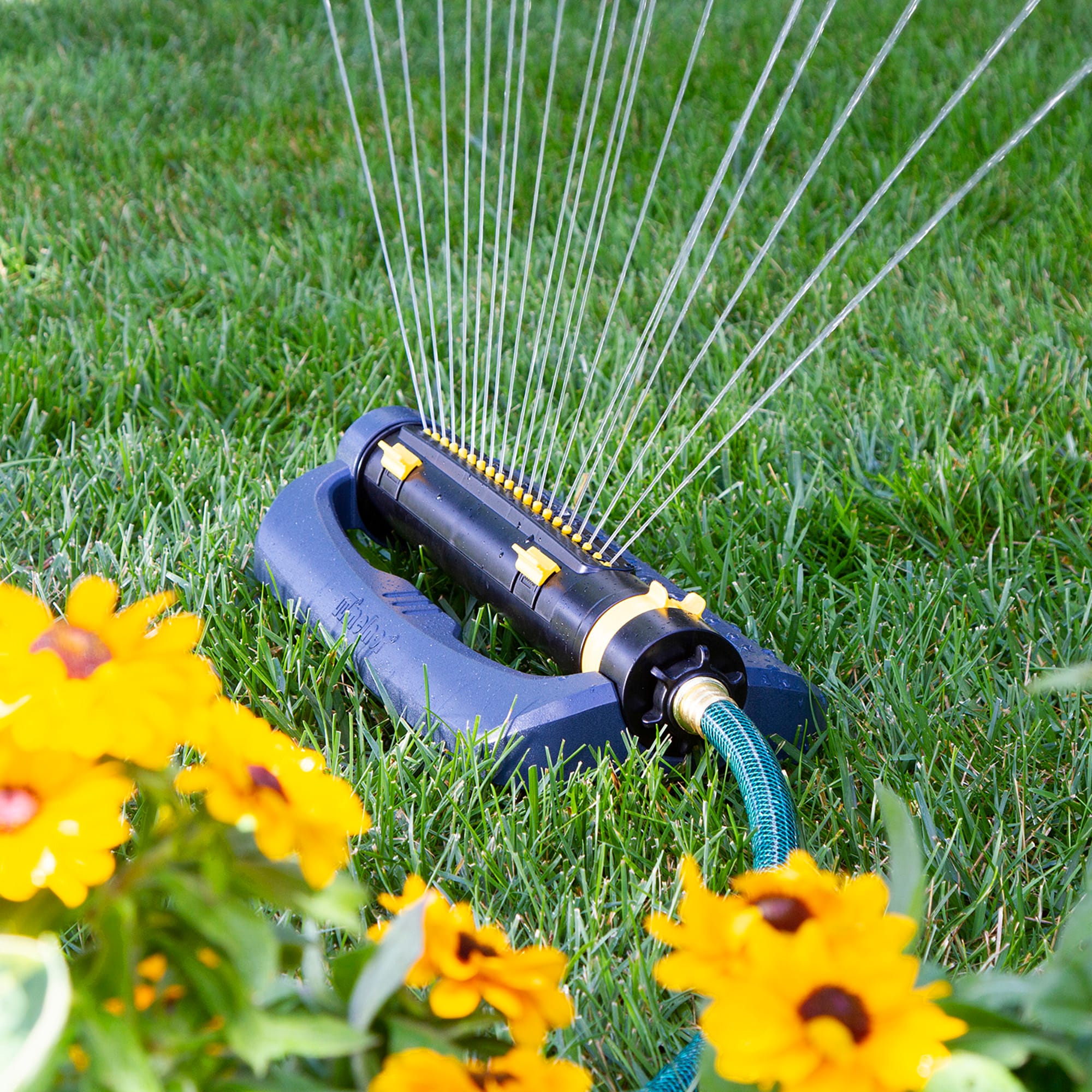 Melnor DuraTek 4500-sq ft Oscillating Sled Lawn Sprinkler 90041-L at ...