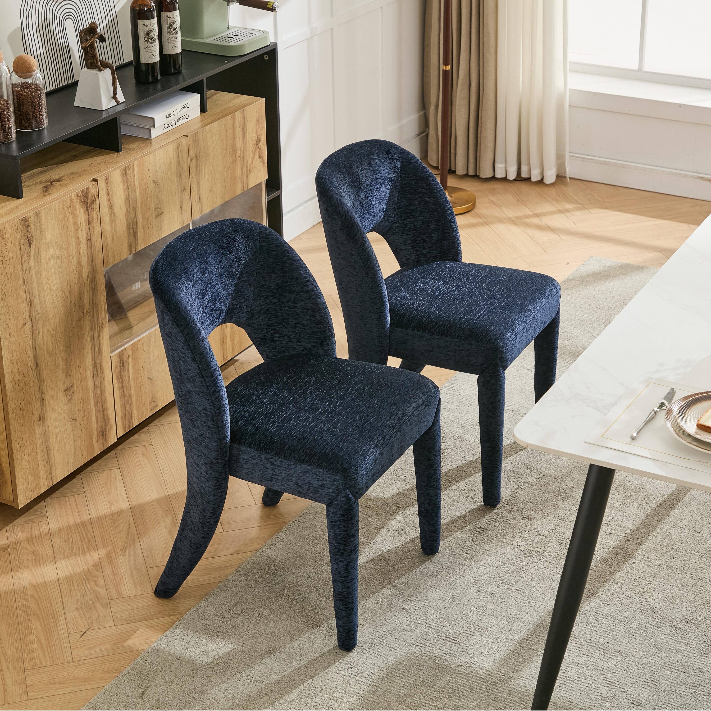 LOVMOR Dark blue chenille dining chair features a hollowed-out backrest ...