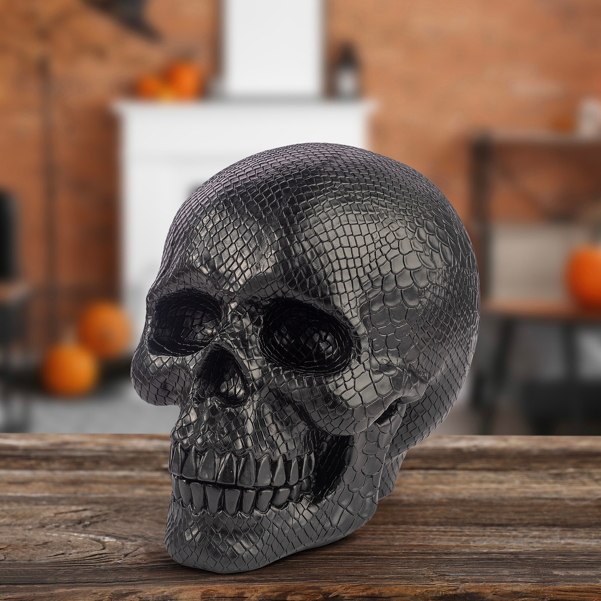 Haunted Living 7-in Black Snakeskin Skull Tabletop Sculpture in the ...